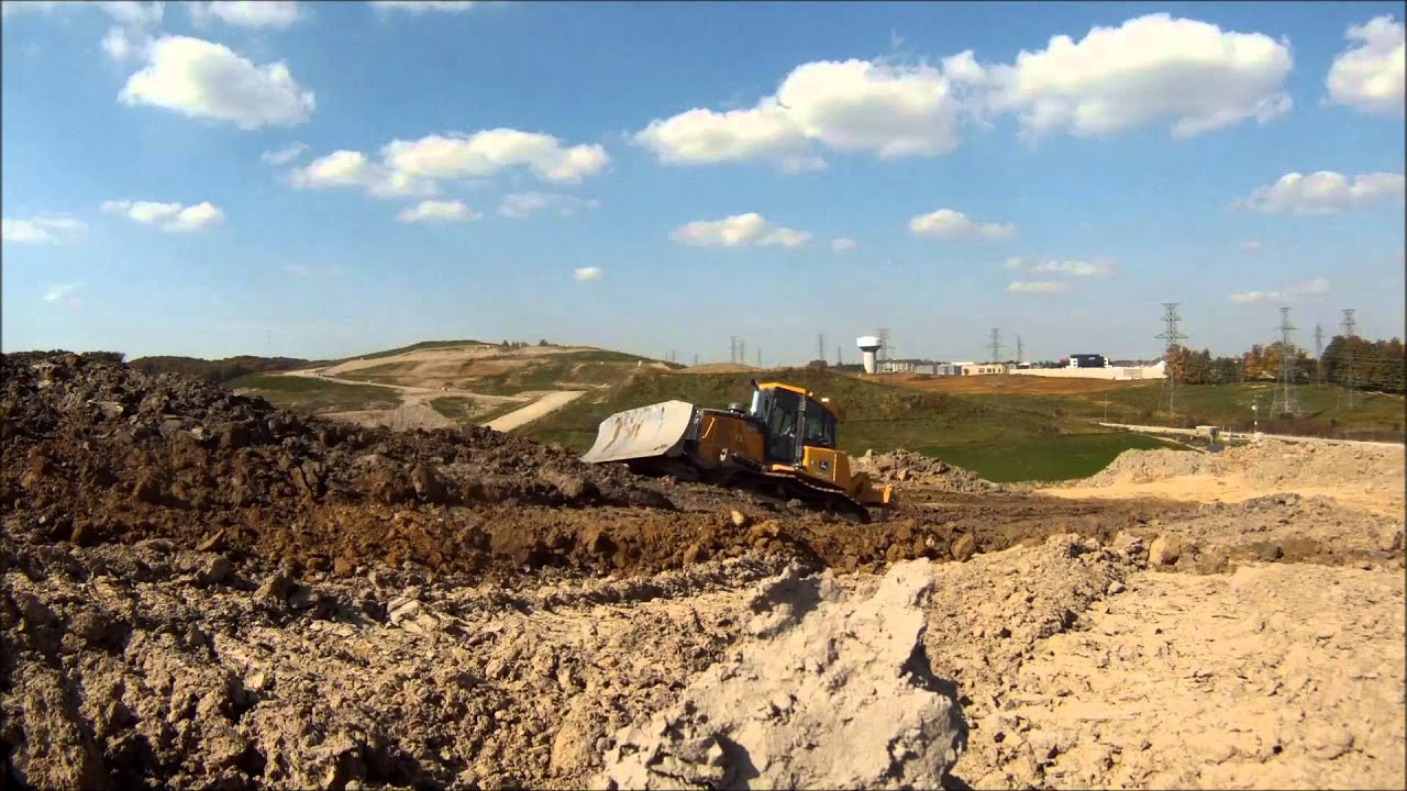John Deere 850k Pushing Clay Fill - YouTube