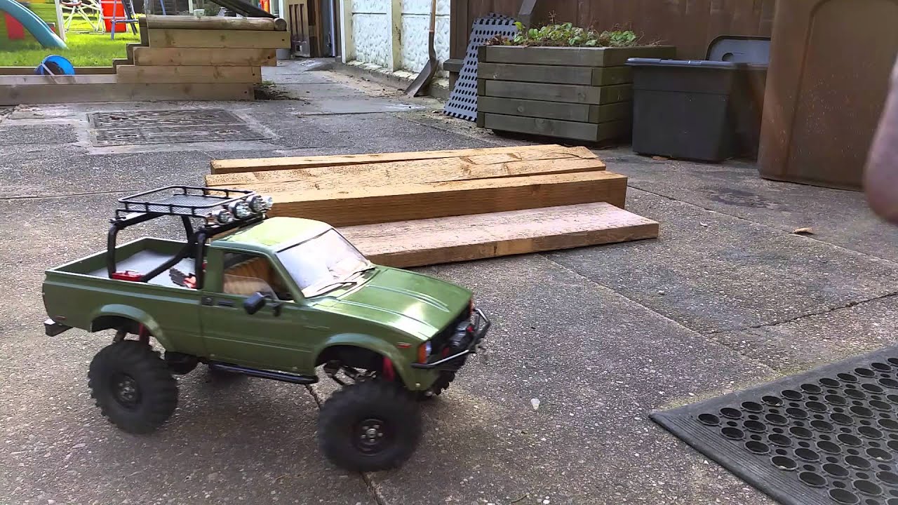 Tamiya Hilux modified with RC4WD parts. - YouTube