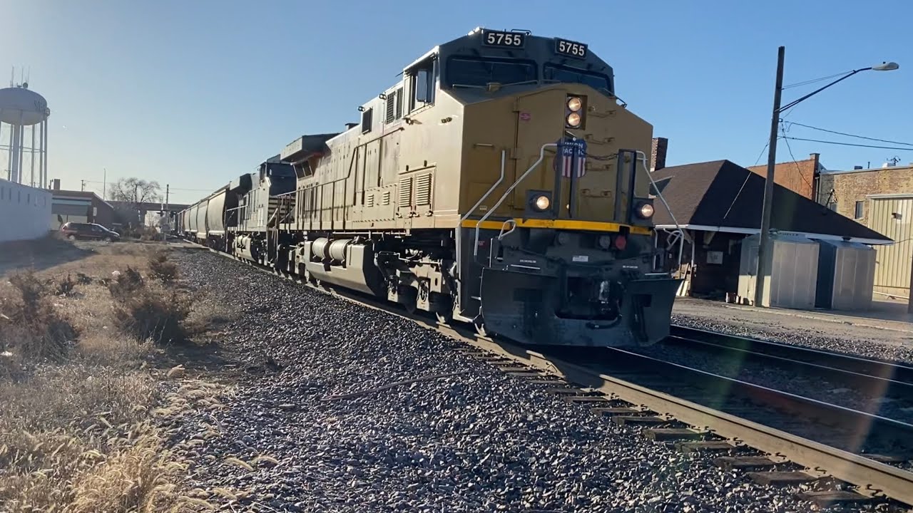 UPRR Freight with Norfolk Southern locomotive hauls unique freight cars ...