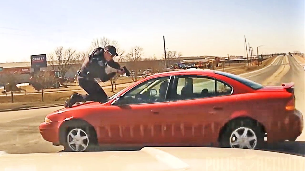 Traffic Stop Ends With Driver Speeding Off With Cop On Top Of Car Hood ...
