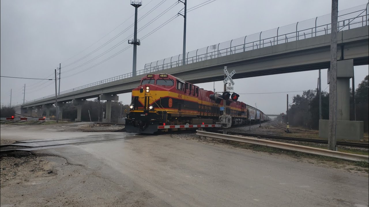 KCS Train 4845 leads a Northbound Grain Train through McNeil Texas ...