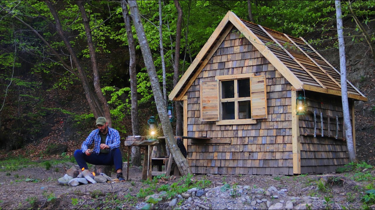 Building a house from pallets by the river. Start to finish - YouTube