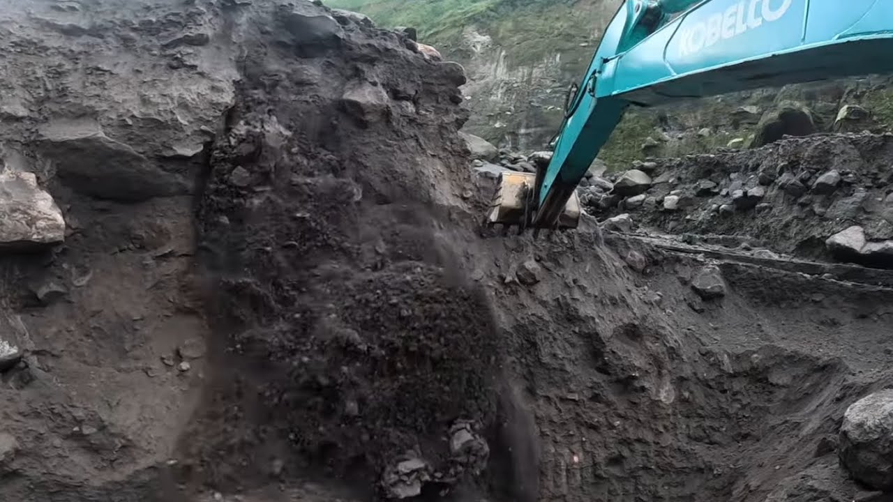 Sand mining|| Excavator works excavating red sand from volcanic ...