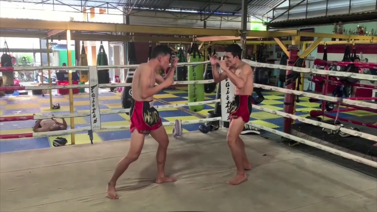 How to escape when your opponent catches your body kick. - YouTube