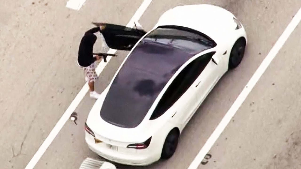 Armed Suspect Carjacks Tesla During High-Speed Chase - YouTube