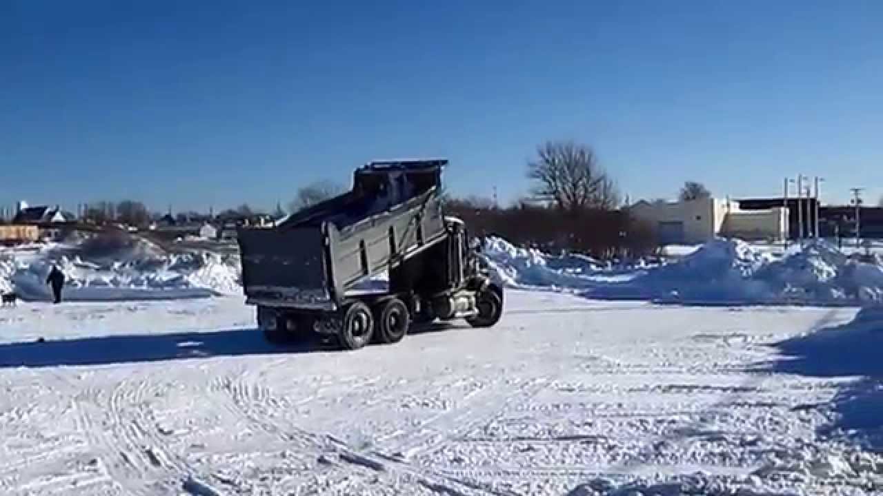 Snow Hauling, Tandem Dump Trucks - YouTube