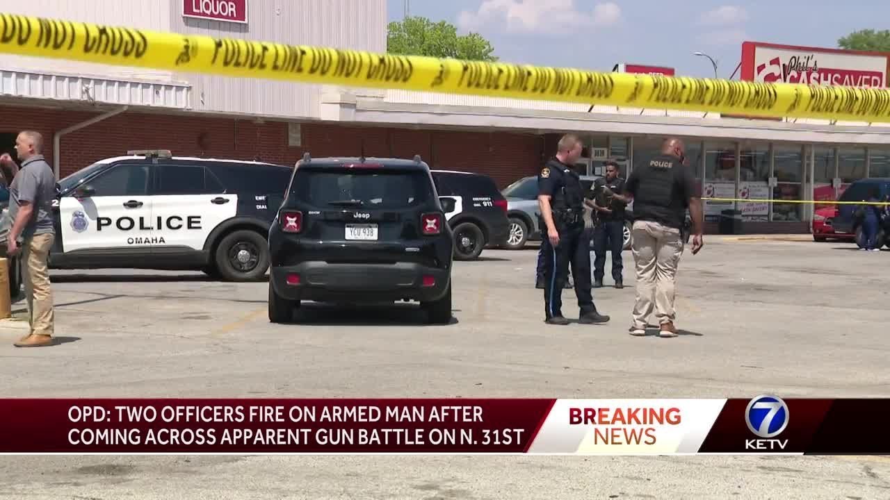 Brazen gun battle with police sends one person to the hospital - YouTube