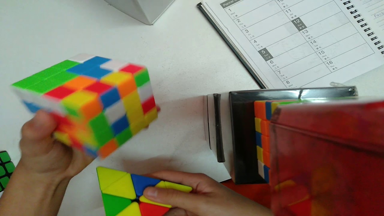 Solving 3x3,4x4 & pyramid Rubik's Cube - YouTube