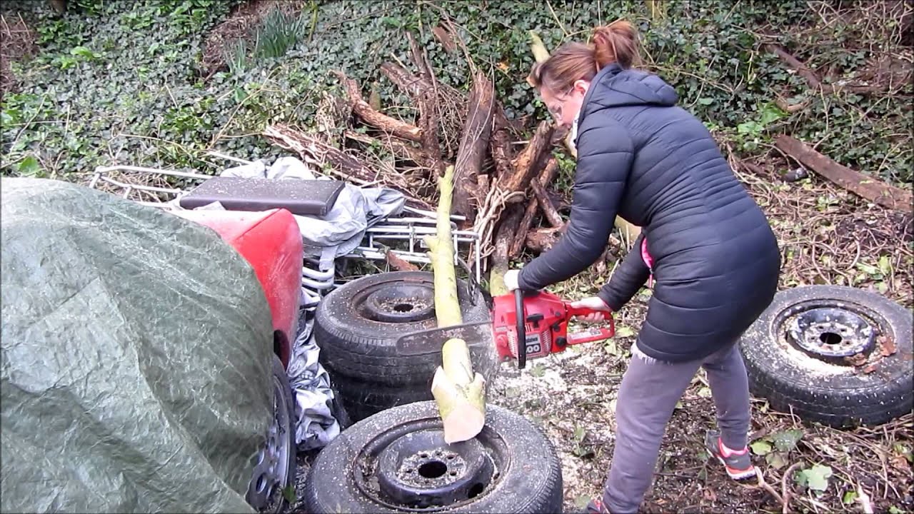 Sarah cutting Logs 2 - YouTube