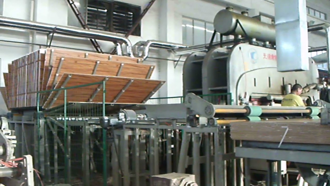 Laminate Flooring Manufacturing - Hot pressing from Carsem Floor - YouTube