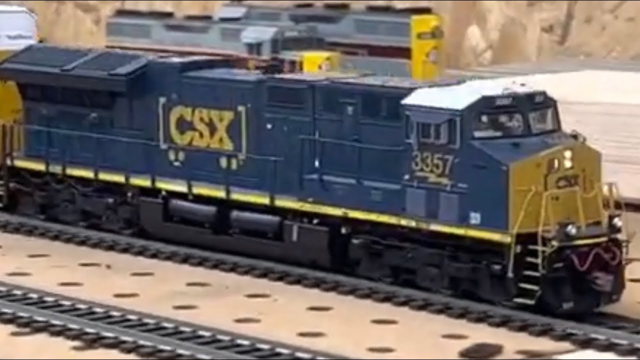 HO scale CSX scale trains gevo pulls very long autorack with one DPU ...