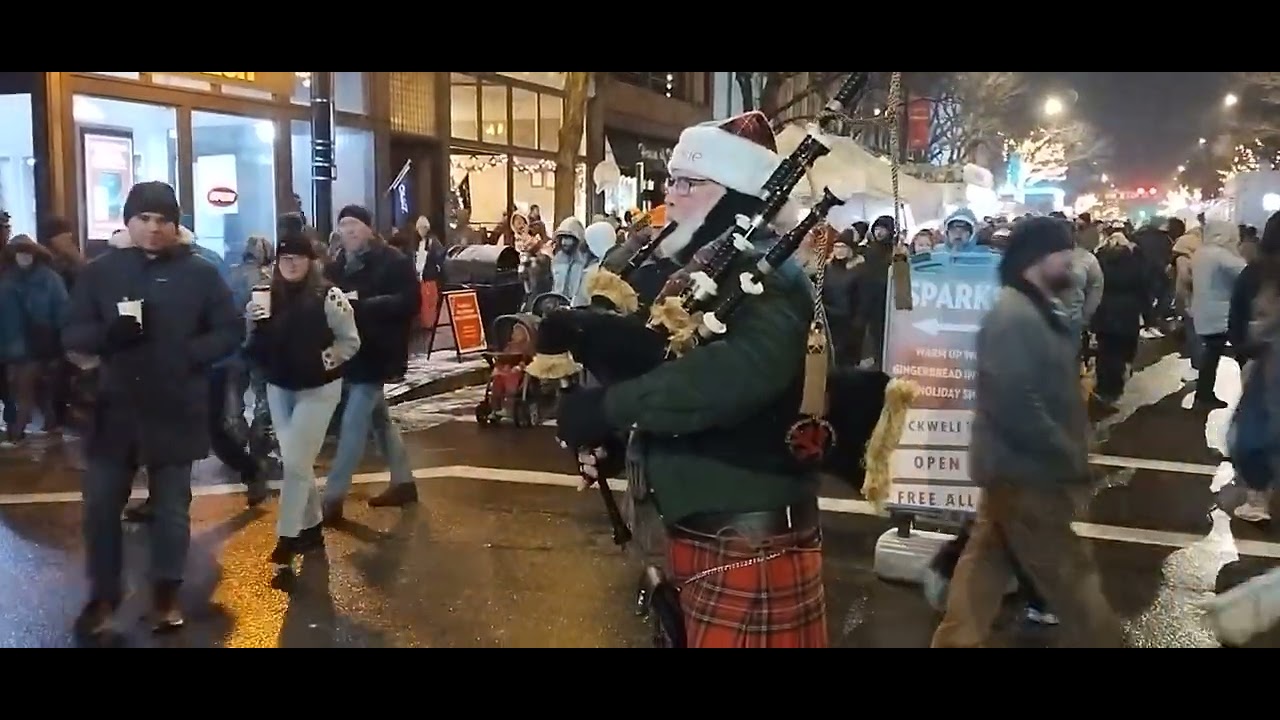 Bagpipe player at Sparkle Corning NY plays "Rudolph" A Great Highland ...
