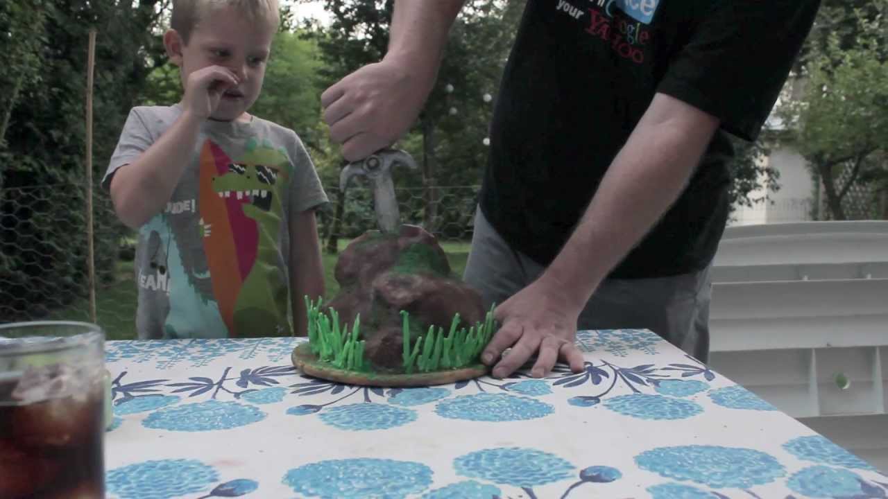 Pulling the chocolate sword from the cake stone - YouTube