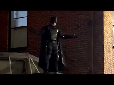 Partygoer dressed as Batman hunts down thief - and scales wall to retrieve bag | SWNS