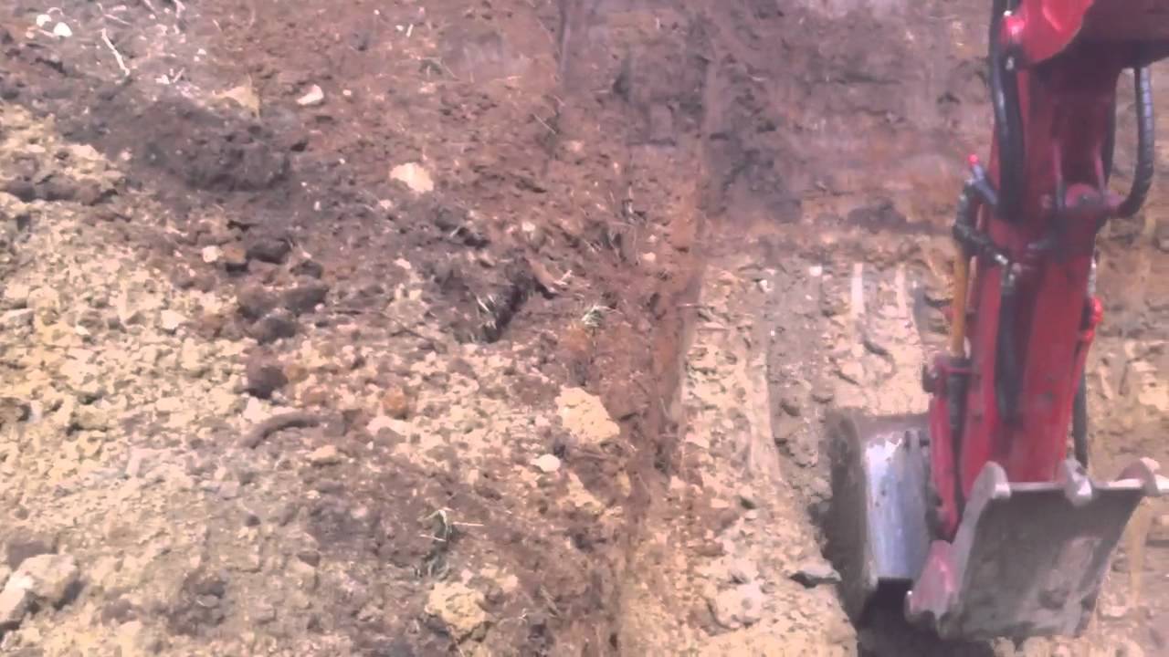 Digging A Rock Pitt With A LinkBelt U75 Spin Ace - YouTube