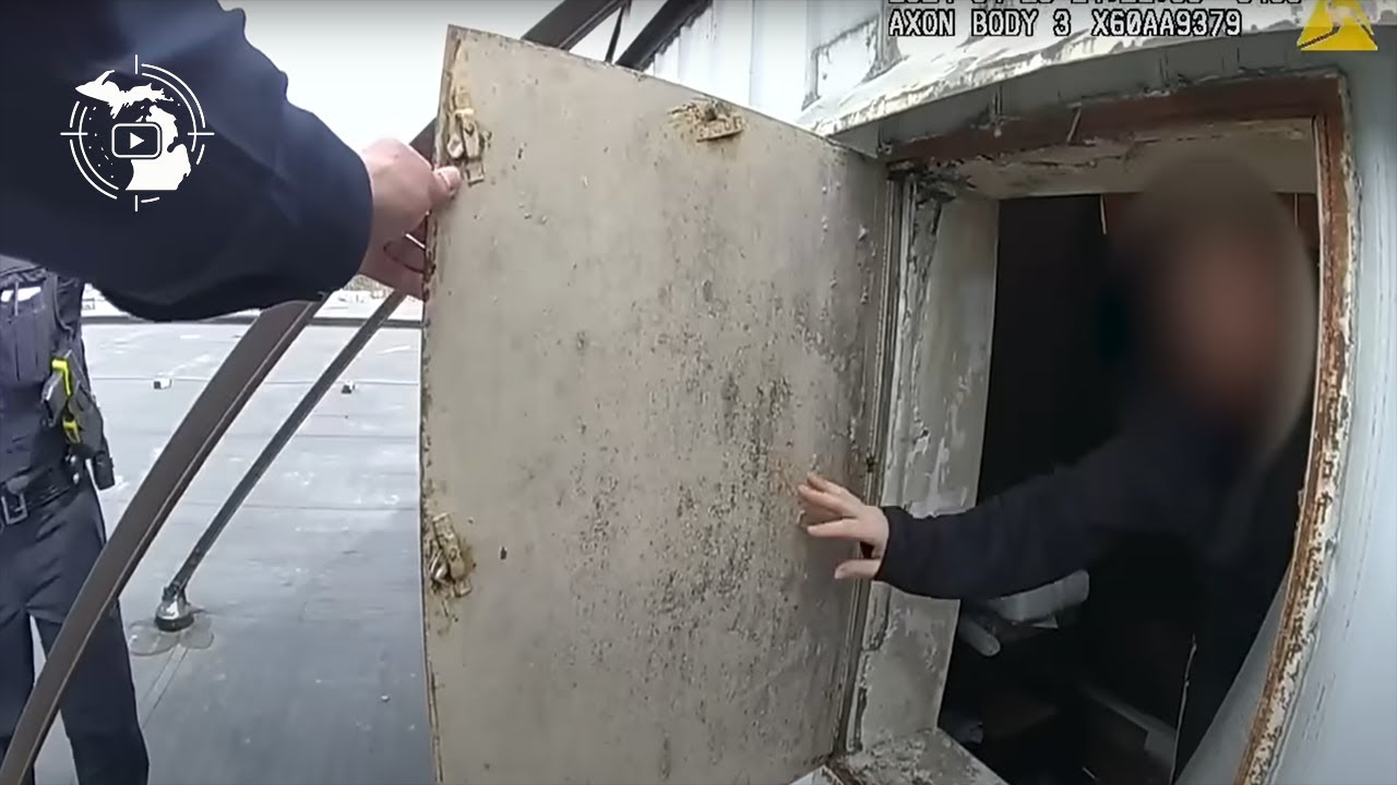 Police Confront Woman Living In Sign On Roof - YouTube