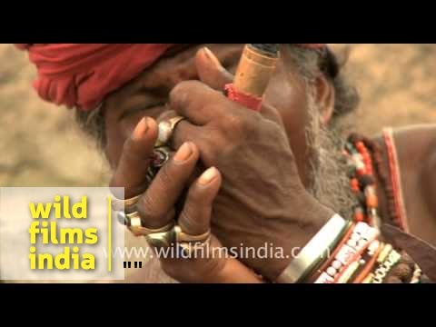 Baba smoking a chillum - YouTube