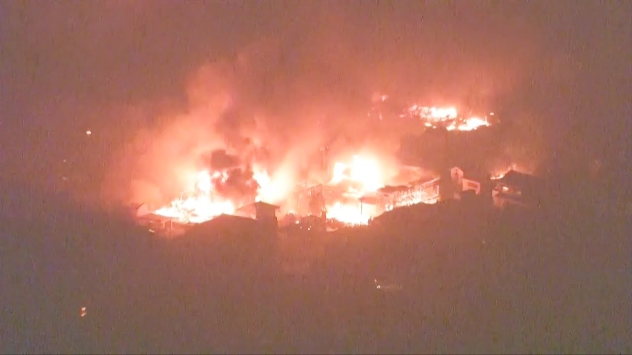 Aerial footage captures forest fire burning in northern Japan - YouTube