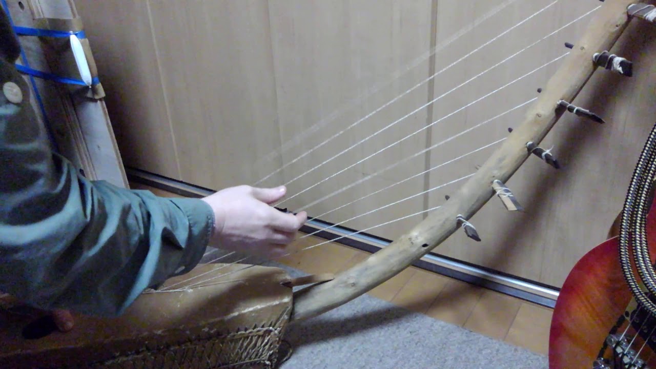 Trying the Adungu Harp - YouTube
