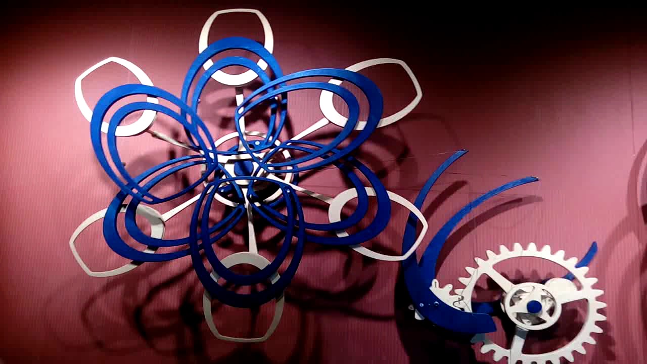 My Derek Hugger designed merlot kinetic wall art - YouTube