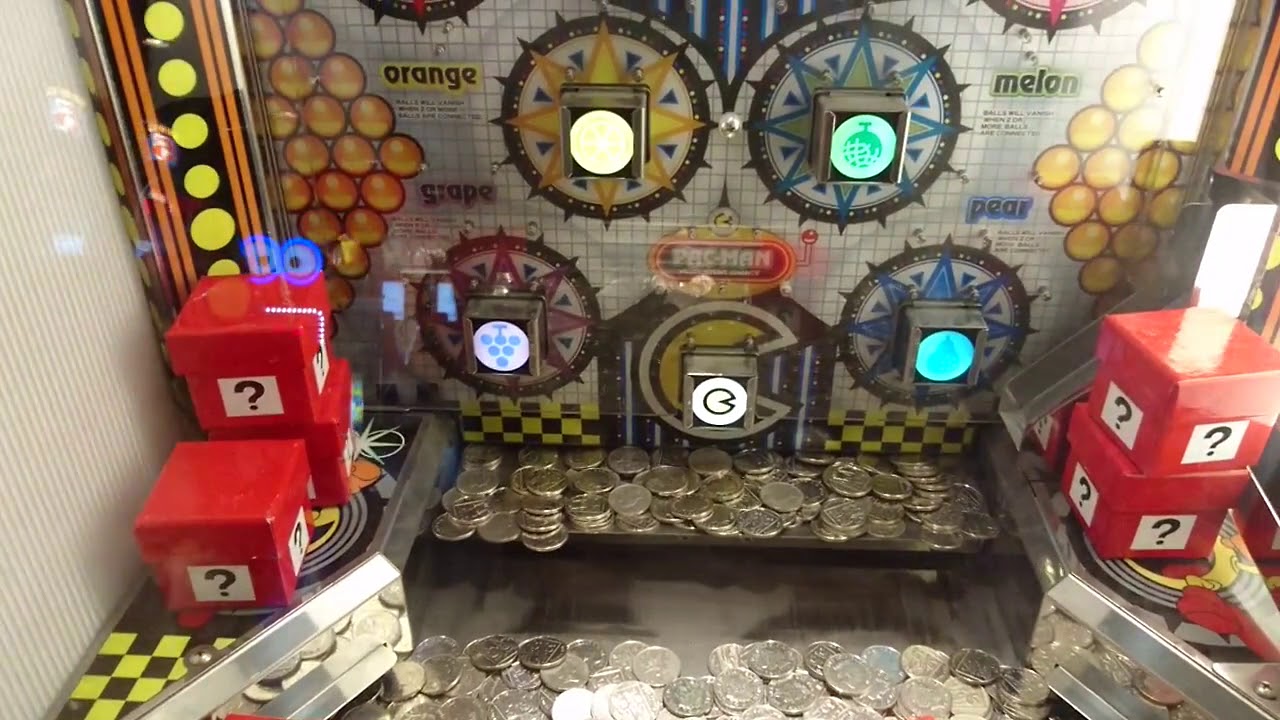 Playing The Pac-Man Ball Coin Pusher In The Arcades - YouTube