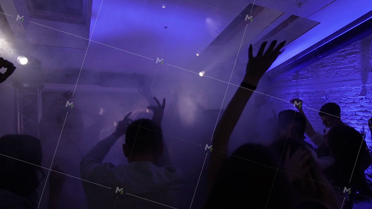 Interior view of modern spacious nightclub with flashing lights and ...
