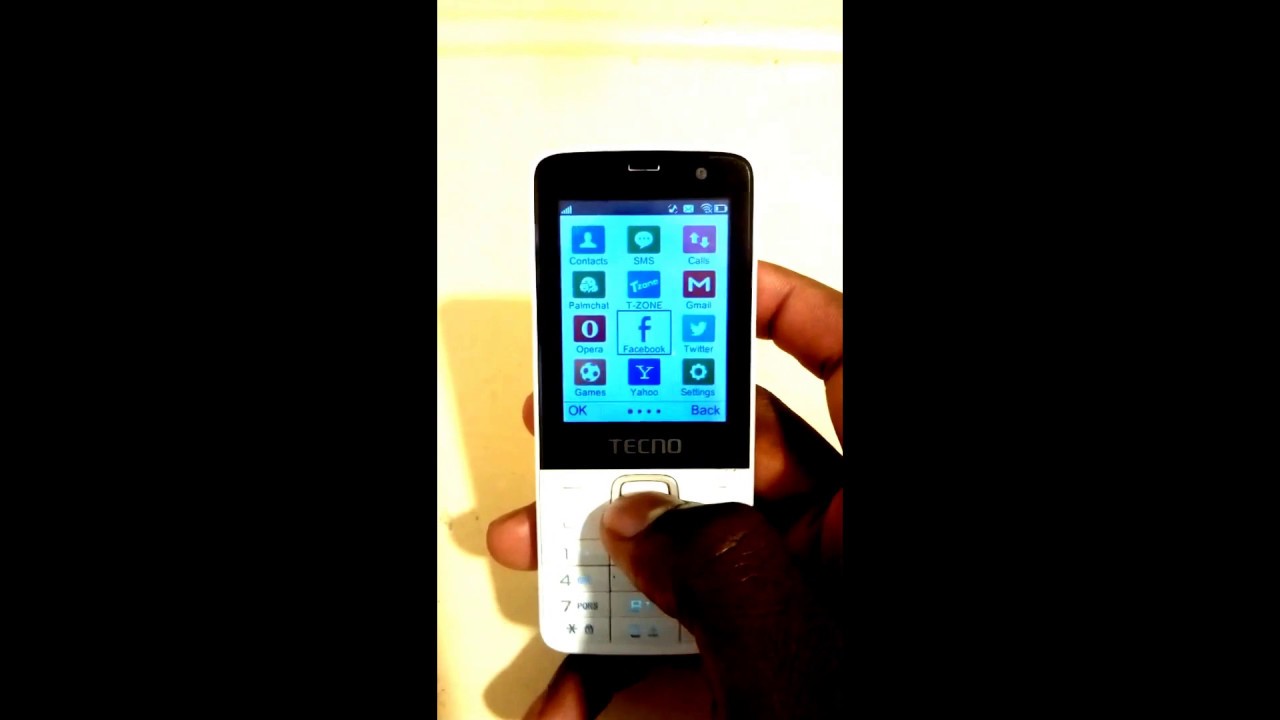 the mind blowing tecno button phone - YouTube