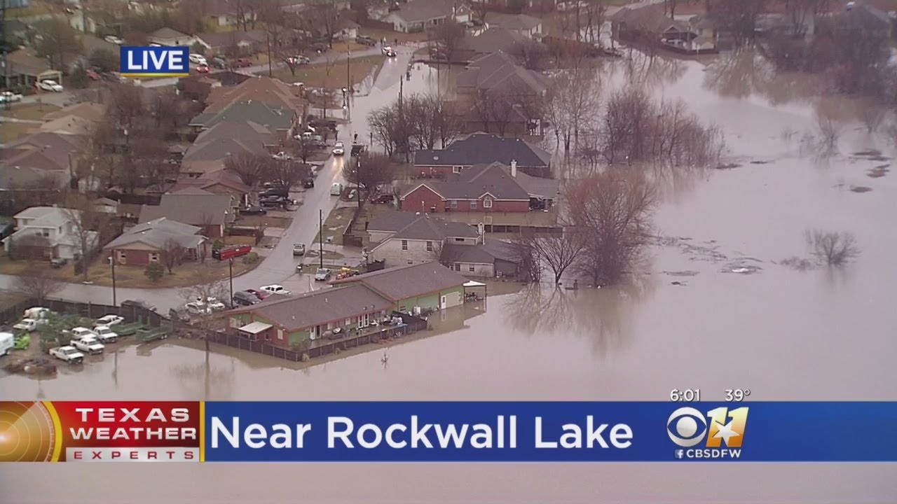 Lake Overflows Into Rockwall Neighborhood - YouTube