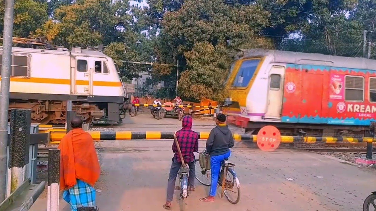 Eastern railway//furiously crossing between two electric locomotive ...