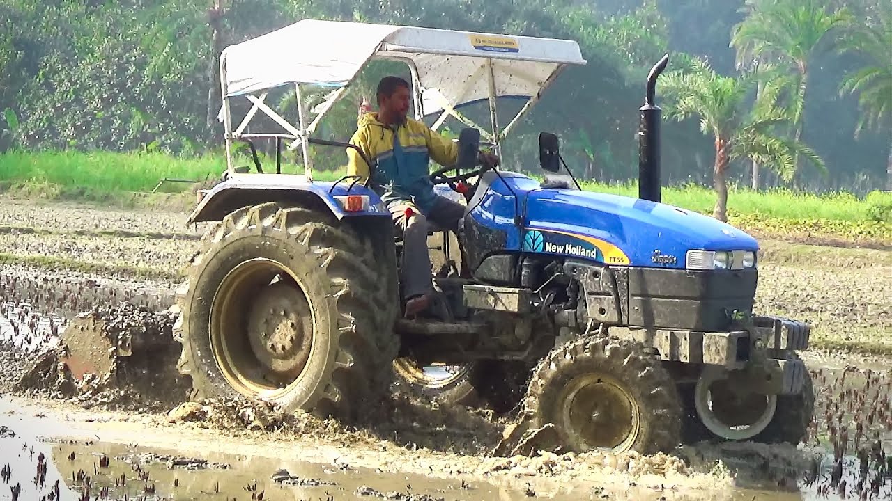 Village Tractor Videos | New Holland Tractors plough In Field ...