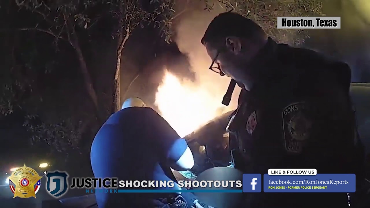 Cops save man from burning car after crash - YouTube