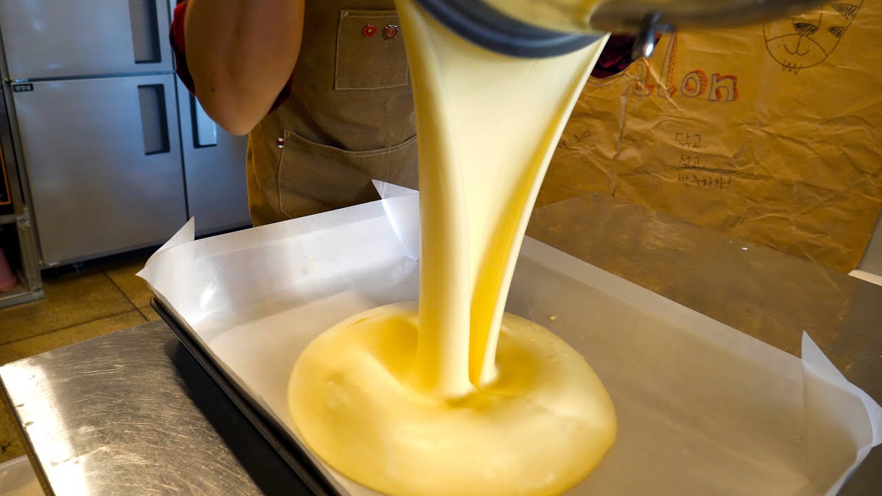 Tiger king bread making in cafe - YouTube