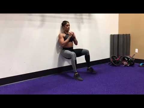Wall sit side to side taps - YouTube