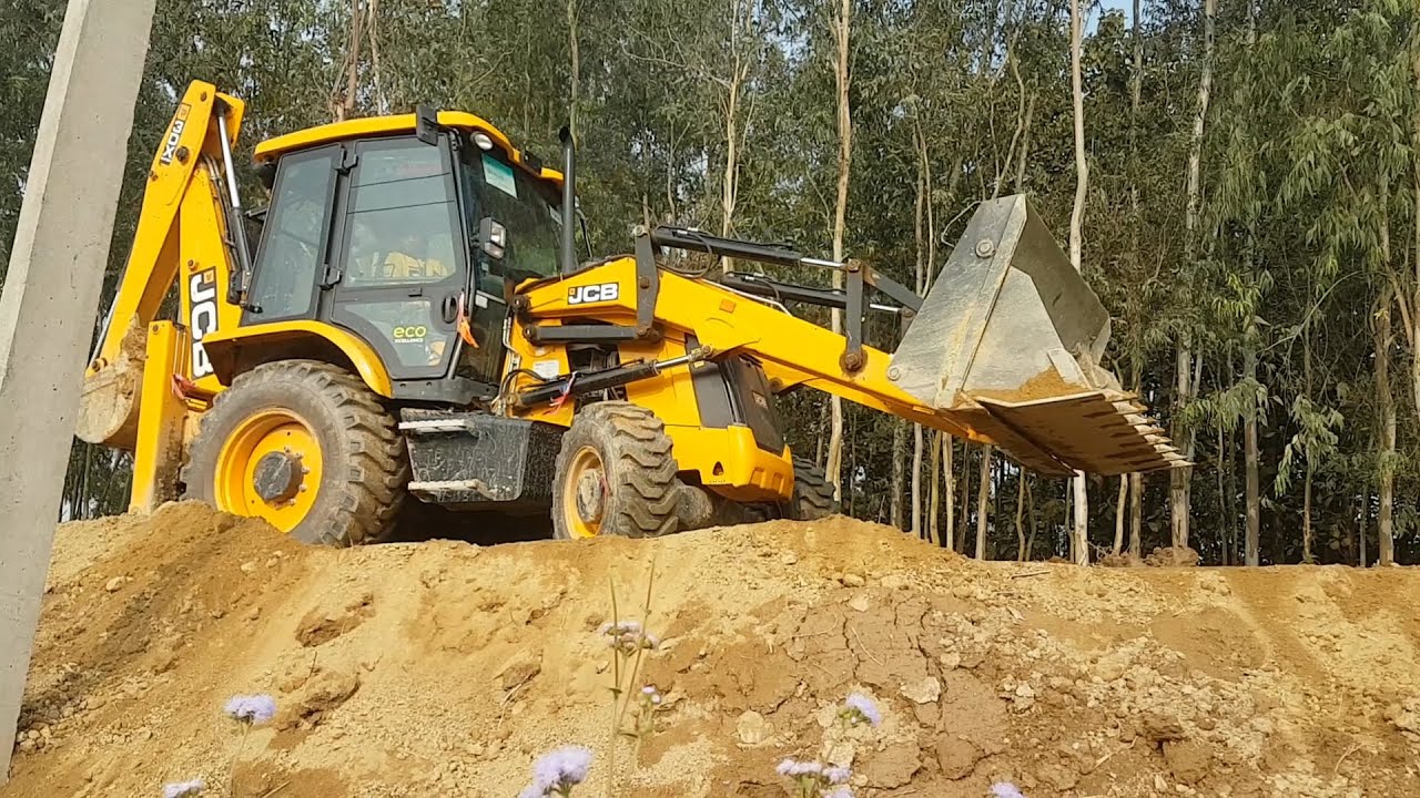 JCB Backhoe Machine Leveling Soil in Road - JCB Dozer Working For ...