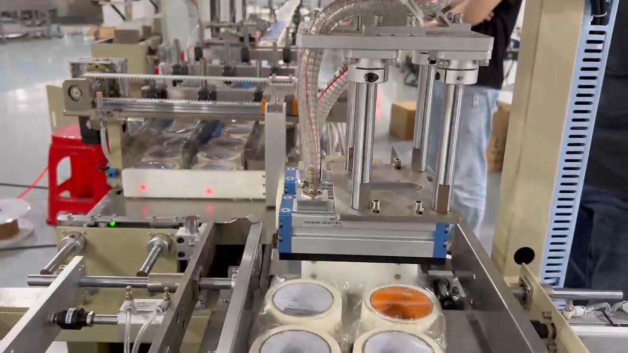 Tapes packing line (sorting + packing + cartoning) - YouTube