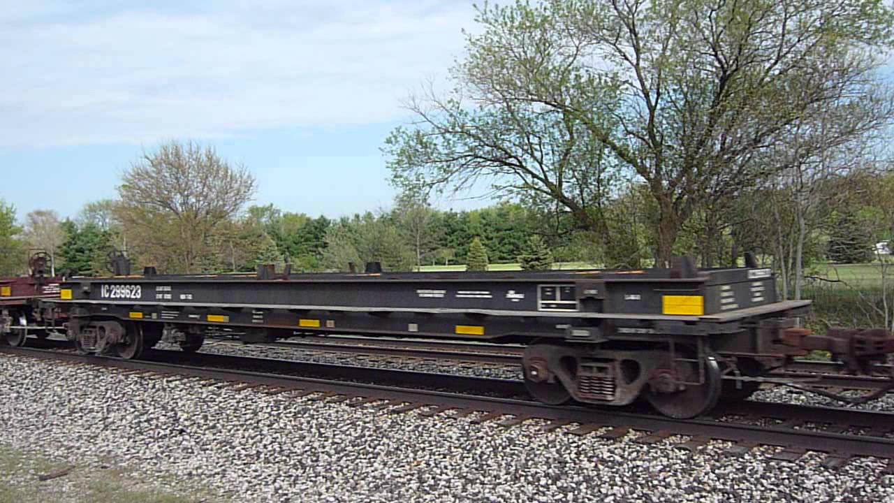 CN 2302 speeds East with steel coil gondola cars. Where did all the ...