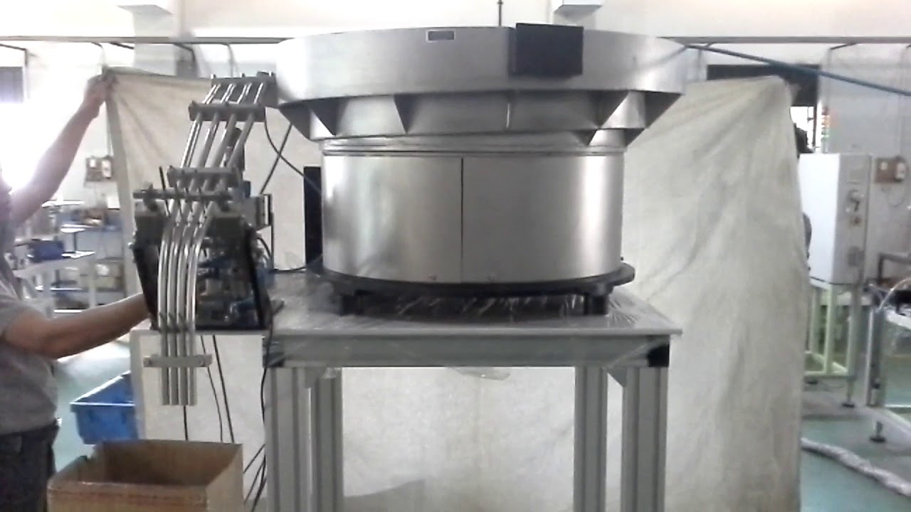 Spring bowl feeder - YouTube