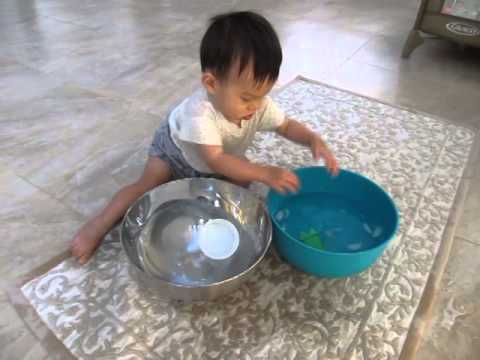 Baby exploring ICE in water sensory play - YouTube