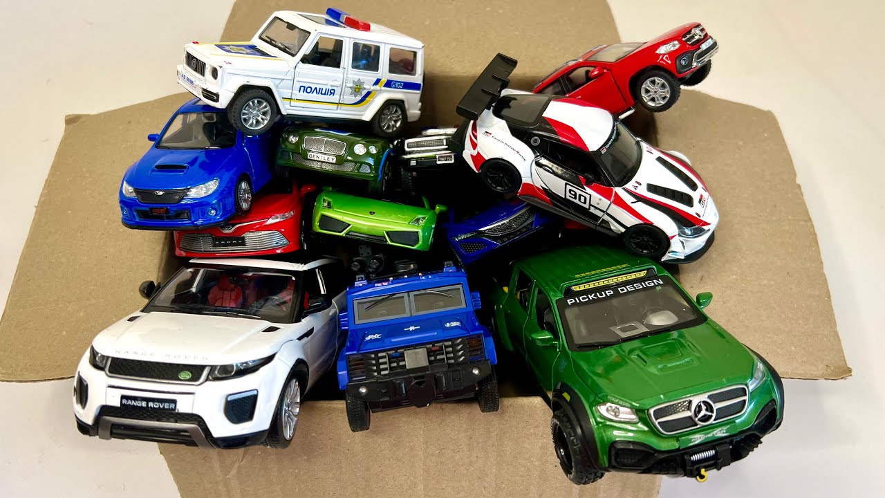 Box Full of Diecast Model Cars Collection: Camry 70, Nissan, Audi Q8 ...
