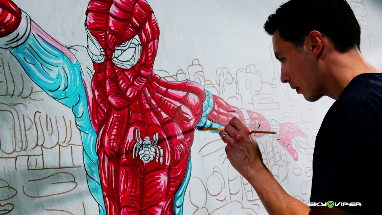 Joe Pimentel makes schools brighter by creating murals with students