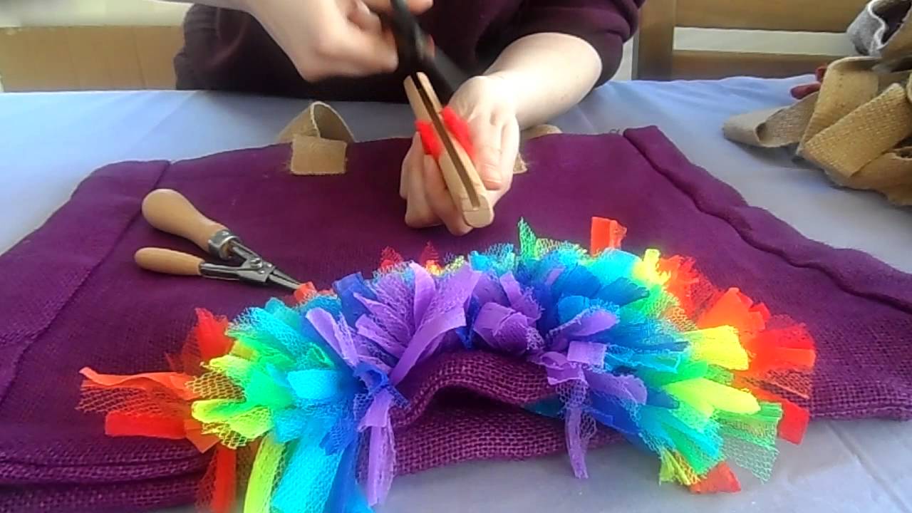 Using a rag rugger on hessian bags - YouTube