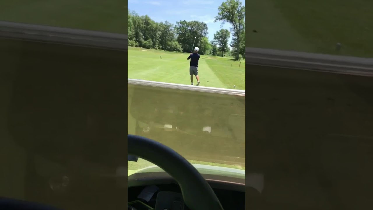 Dpdt white hat unsuspecting golfer hit by golf cart after swing - YouTube