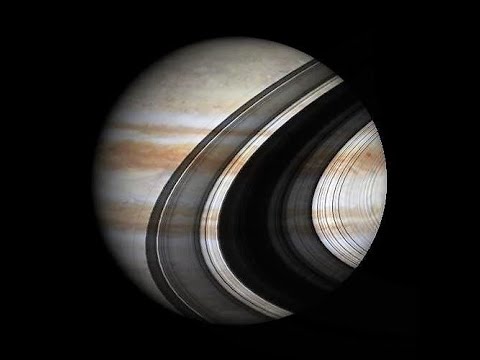 saturn's silhouette crosses jupiter: an immaculate occultation (viewed from neptune)