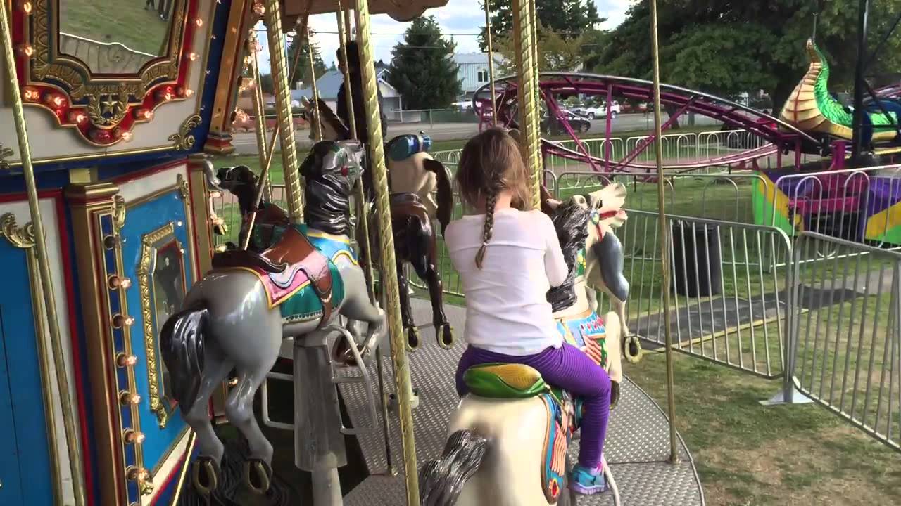 Merry go round at the fair - YouTube