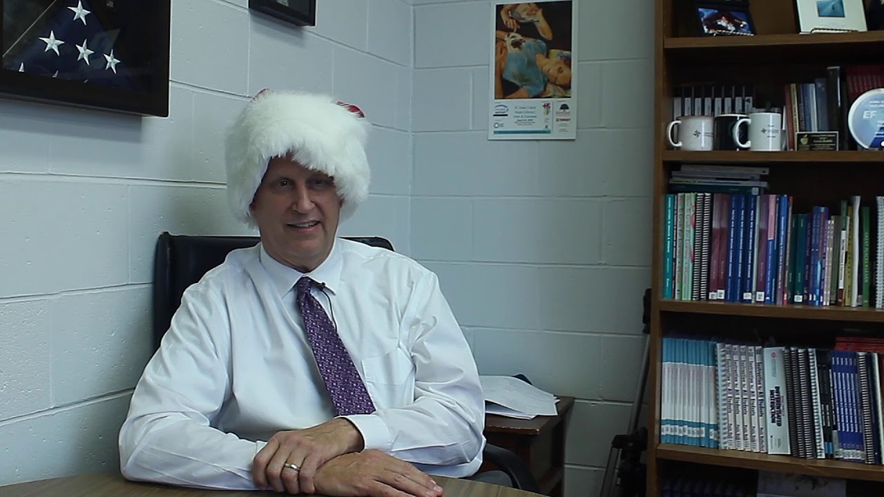 Principal Kevin Rohlfs is Santa's helper in yearly after school party ...