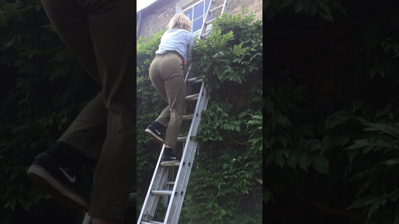 Girl skirts up ladder - YouTube
