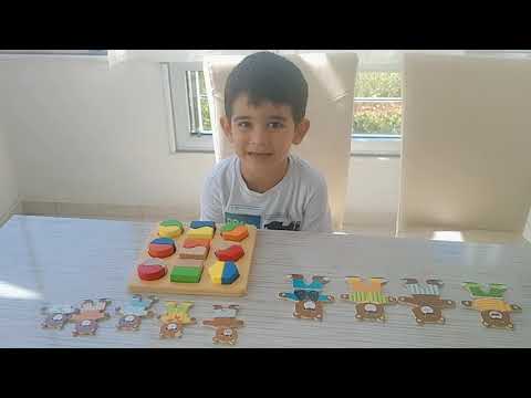Umut Görkem Ayılı pazıllarını yapıyor. Geometrik şekilli parça bütün oynunu oynuyor.