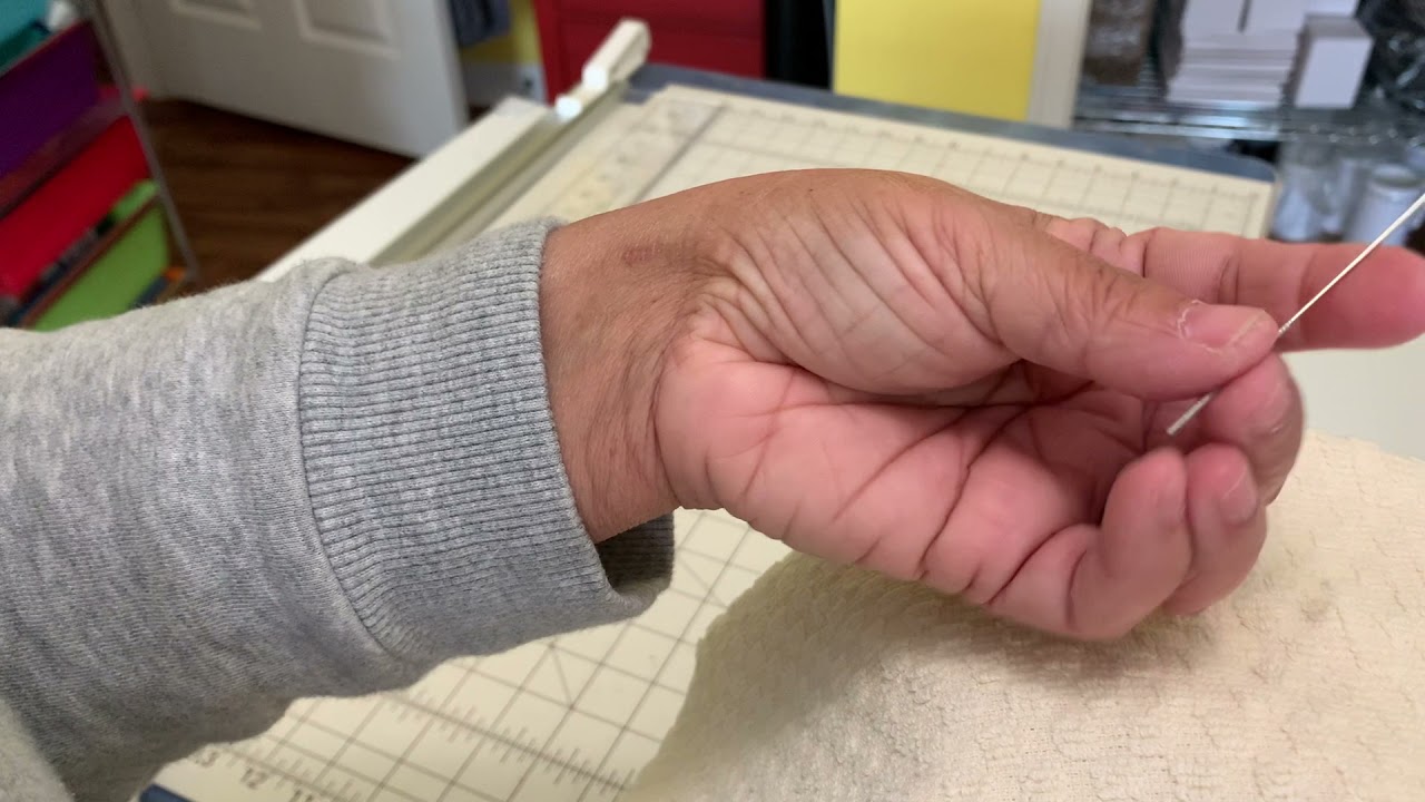 How to Use a Snag Needle - YouTube