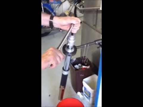 Greg Ball Motorcycle Engineering Fork work-station - YouTube