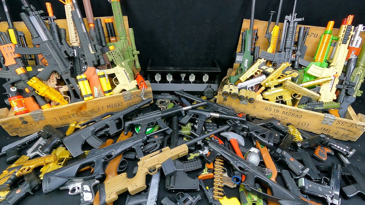 Two Giant Wooden Chests of Toy Rifles, Sniper Rifles, Bead Throwers ...
